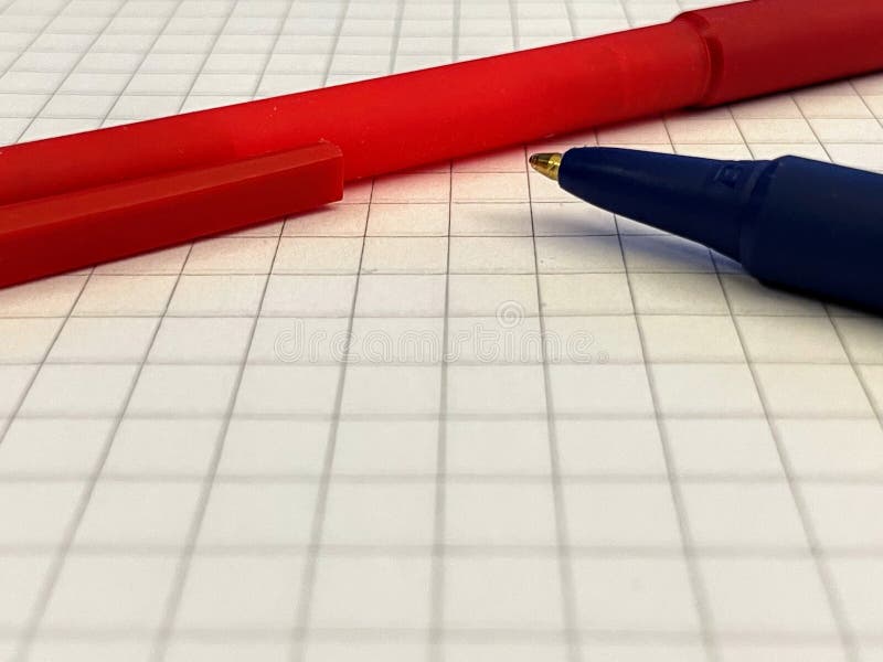 Blue and Red Pens on the White Grid Paper Stock Image - Image of office ...