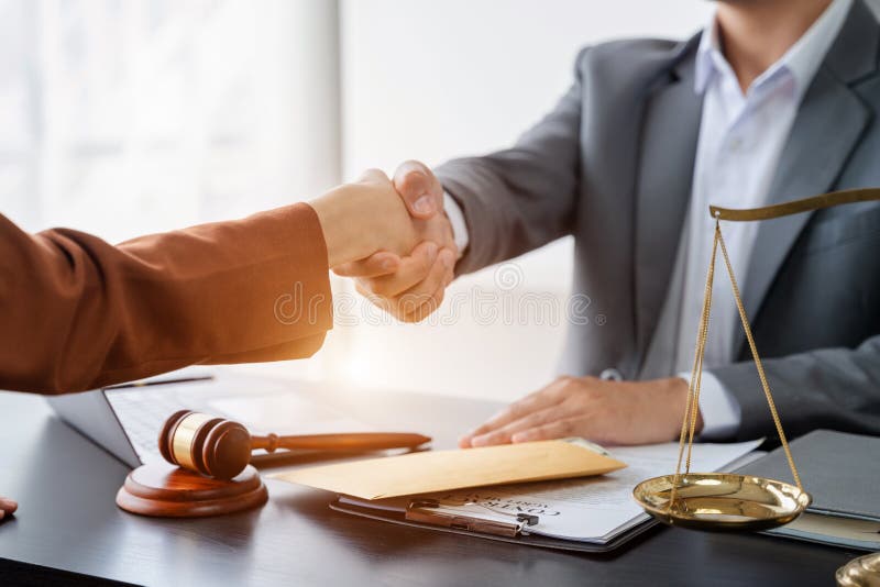 Partner Lawyers Attorneys Shaking Hands after Discussing a Contract ...