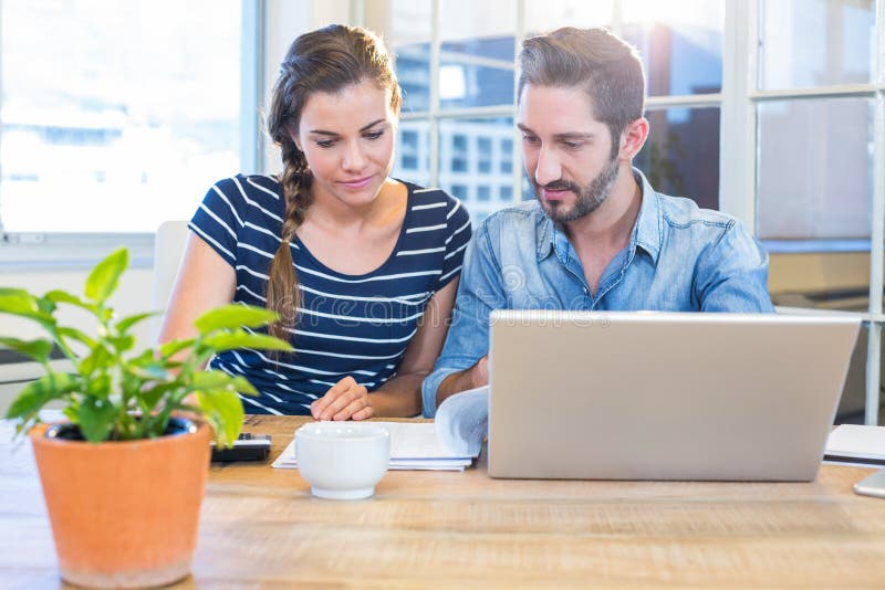 Partners Calculating Together with Calculator Stock Photo - Image of ...