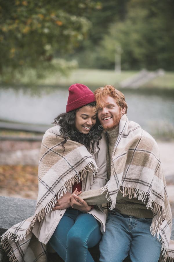 Partners Covered with a Laid Having a Romantic Date Stock Photo - Image ...