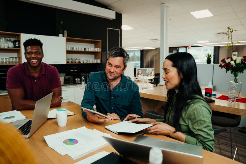 Partners Gathered Together Laughing with Bonding Discussing Work for ...