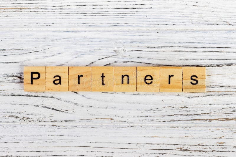 Partnership Word Written On Wood Block. Partnership Text On Wooden ...