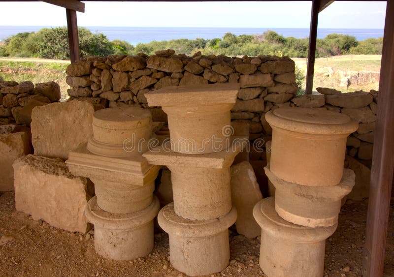 Parts of Ancient Columns and Stone Blocks Stacked Under a Canopy at an ...
