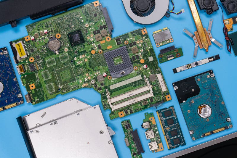 Parts of a Modern Computer. the Insides of a Laptop on a Blue ...