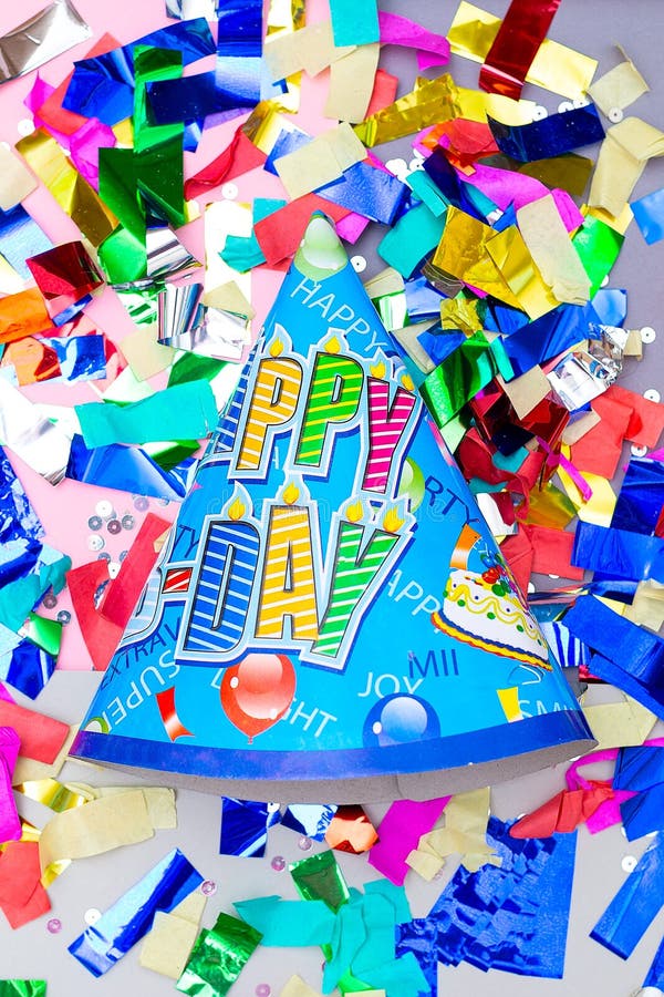 Party Cap and Confetti Bright. Vertical Stock Photo - Image of shiny ...