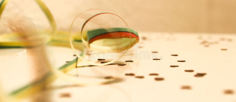 Party with Confetti on a White Table Stock Image - Image of green ...