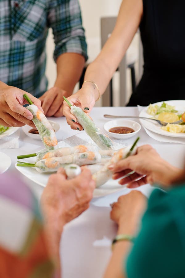 Party eating spring rolls stock image. Image of freshness - 202201433