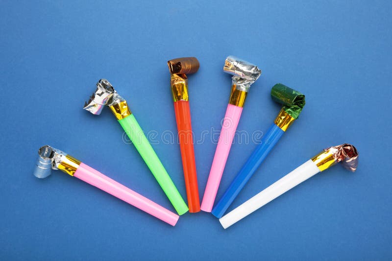 Party Foil Whistle Noise Maker Horn Rolled Blue Background Stock Photos ...
