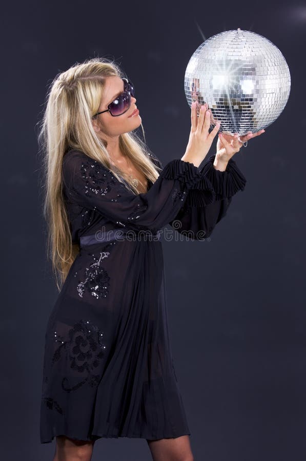 Party girl with disco ball stock photo. Image of babe - 10529084