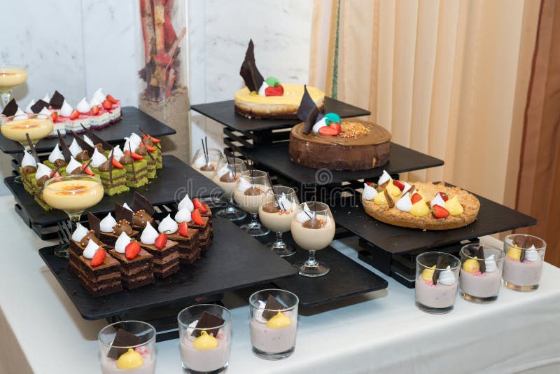 Party Reception. Dessert Buffet. a Table Filled with Assortment of ...