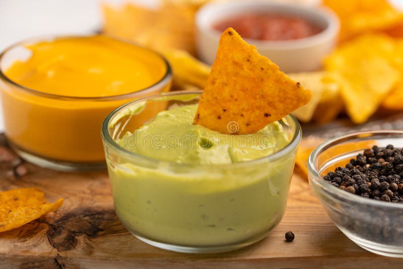 Party Snacks, Various Types of Chips with Dip and Salsa, Top View Stock ...