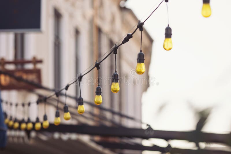 Party String Lights Hanging in a Line. Hanging Light Bulbs in Outdoor ...