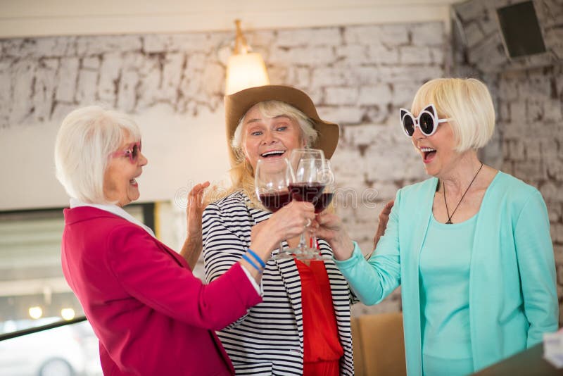 Three Senior Happy Ladies Having a Party and Looking Enjoyed while ...