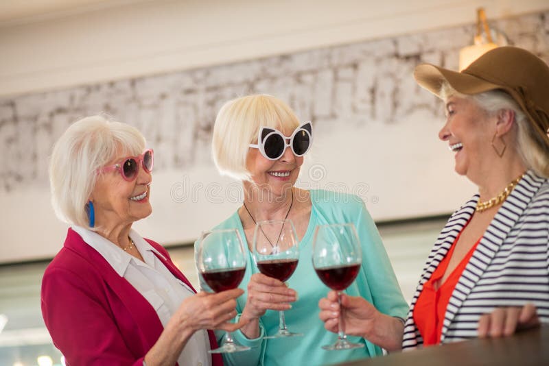 Three Senior Happy Ladies Having a Party and Looking Enjoyed while ...