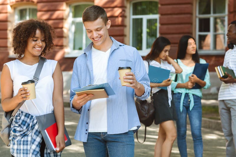 Pass Time between Classes. Cheerful College Students Drinking Coffee ...