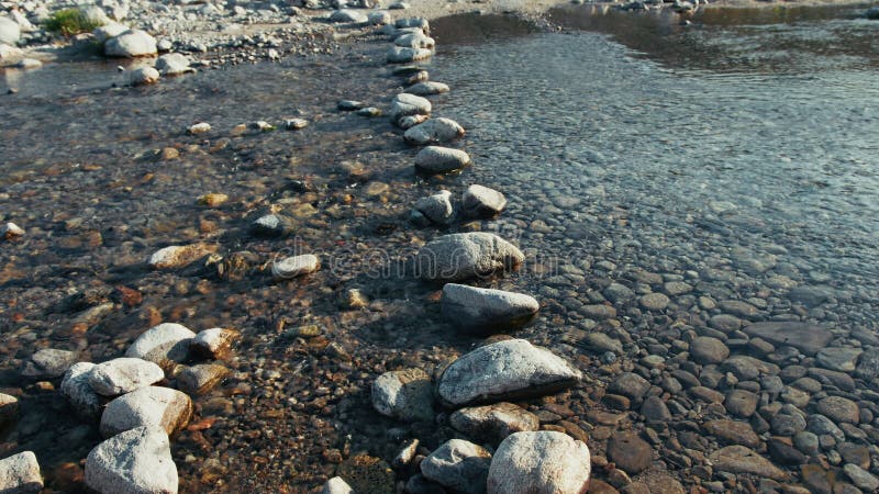 Passage Crossing a River Made with Stone Pebbles into the Water Flowing ...