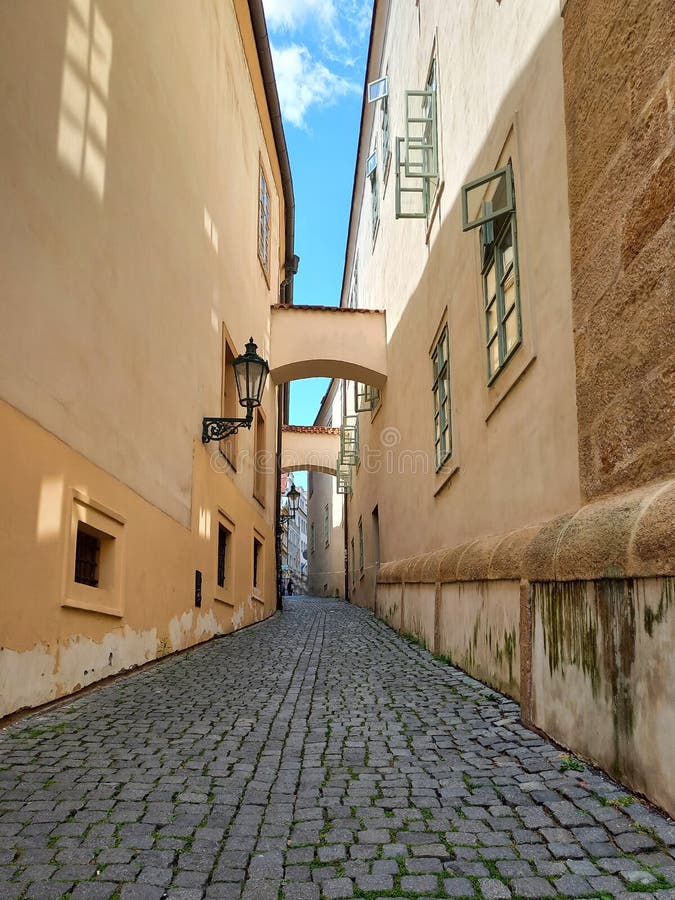 A Passage in the Form of a Cobblestone Sidewalk between Two Ancient ...