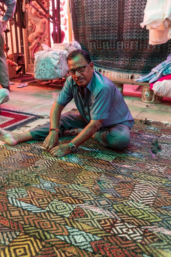 Trimming Long Threads Off a Rug at a Textile Factory in Jaipur ...