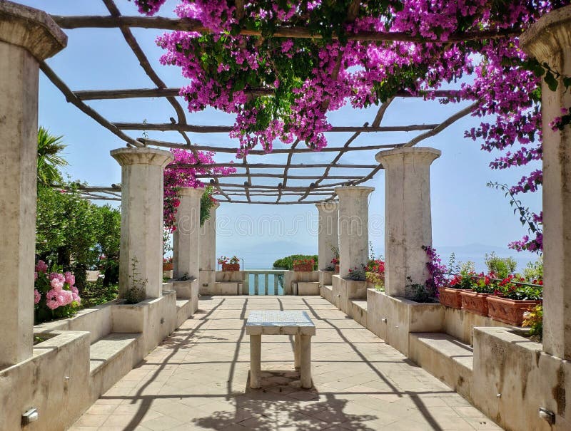 Passage with Small Table in the Middle and Granite Pillars on the Sides ...