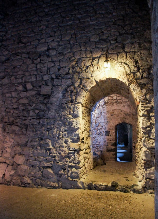 Passage in the stone wall. editorial photo. Image of indoors - 119501751