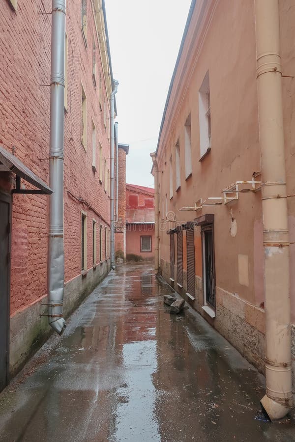 Passage between Two Buildings during Rain Stock Photo - Image of ...