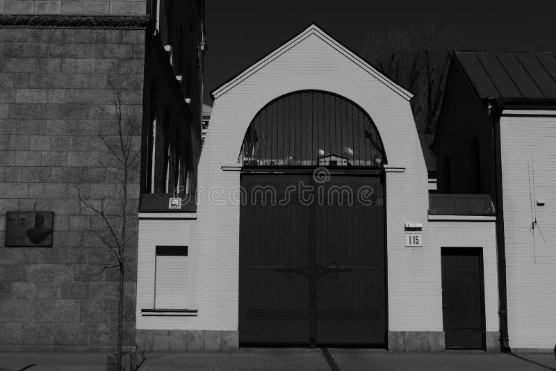 In the Passage between the Two Buildings are a Large Gate and a Small ...