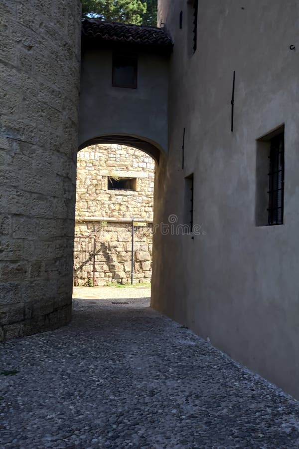 Passageway with an Arch between Two Buildings Stock Image - Image of ...