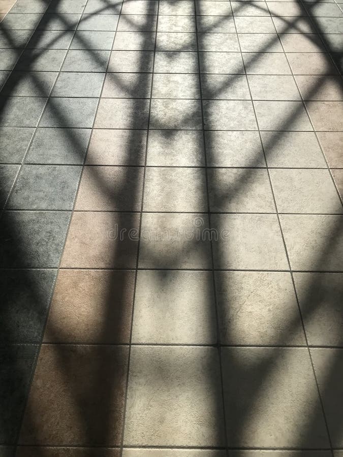 Beautiful Shadows Form a Geometric Pattern on Floor. Close Up. Stock ...