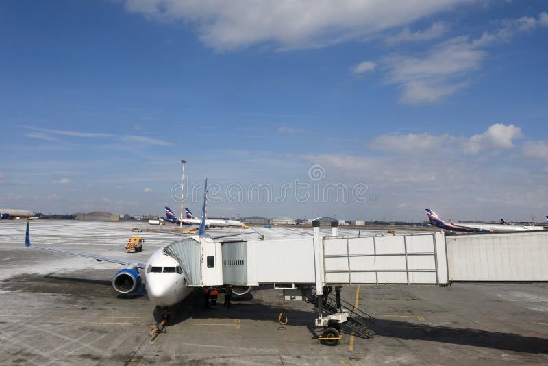 Passenger aircraft loading stock image. Image of gate - 144808879