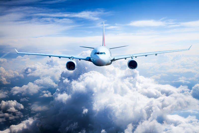 Passenger Airliner In The Sky Stock Photo - Image of cargo, clouds ...