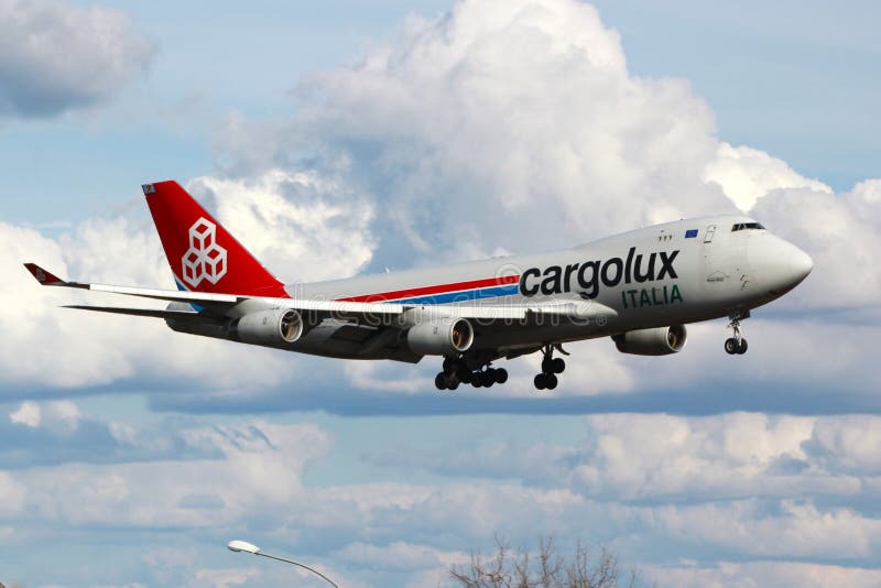 A Passenger Airplane that is in the Air and is Landing Editorial Stock ...