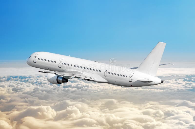 Passenger Airplane Fly on a Hight Above Overcast Clouds and Blue Sky ...