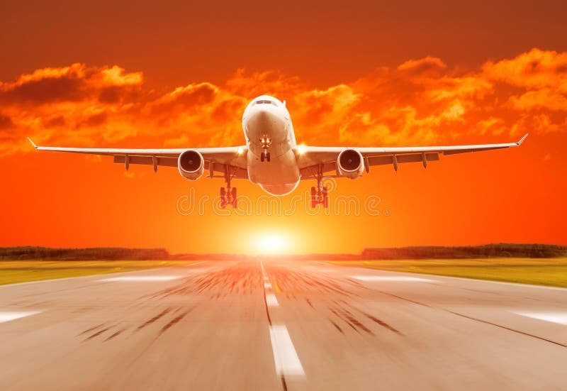 Passenger Airplane Landing at Sunset on a Runway. Stock Image - Image ... Passenger Airplane Landing at Sunset on a Runway. Stock Image - Image ...