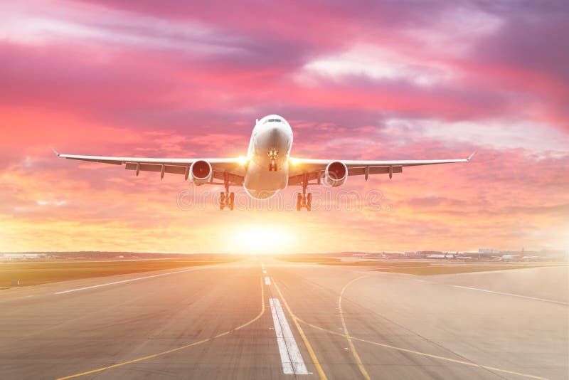 Passenger Airplane Landing at Sunset on a Runway Stock Image - Image of ... Passenger Airplane Landing at Sunset on a Runway Stock Image - Image of ...