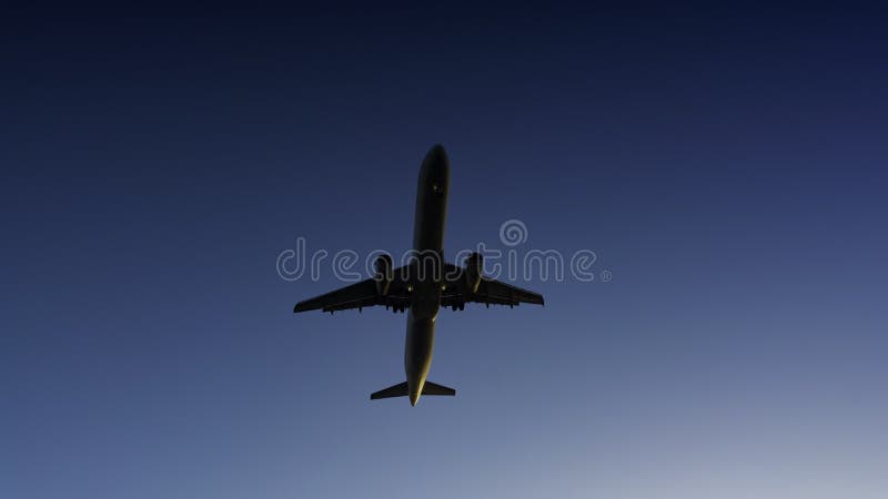 Passenger Airplane Low Pass on Sky Stock Photo - Image of plane, cloud ...