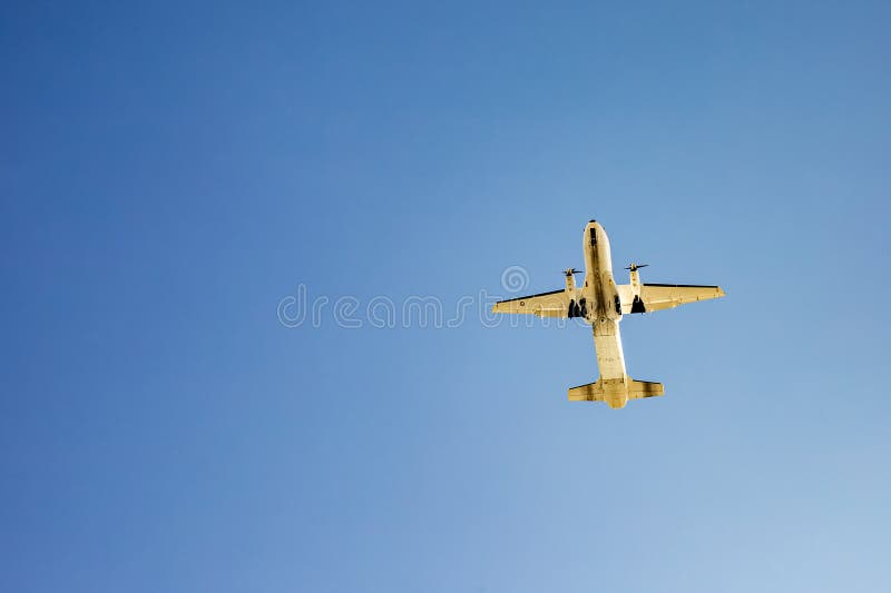 Airplane Soaring High in the Sky. Stock Photo - Image of vertical, view ...