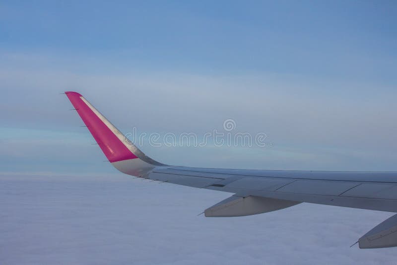 Passenger Airplane Wing in the Sky in Clouds. Stock Photo - Image of ...