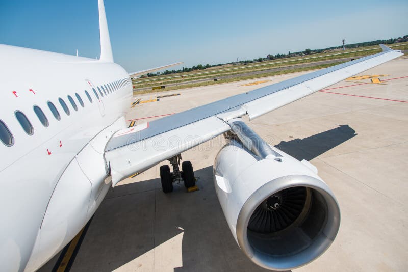 Passenger airplane wing stock image. Image of transport - 96008801