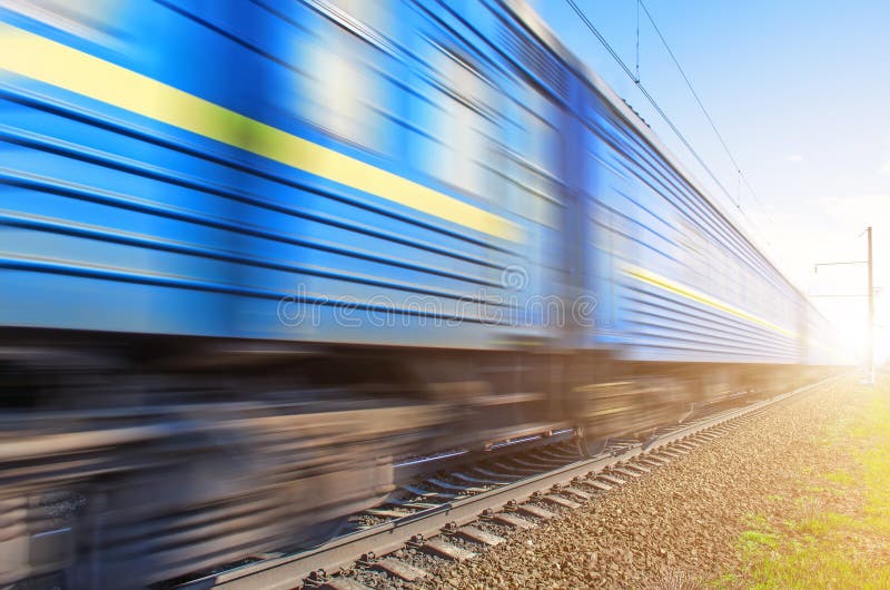 Passenger Blue Wagons at a Speed Passing Railway. Stock Photo - Image ...