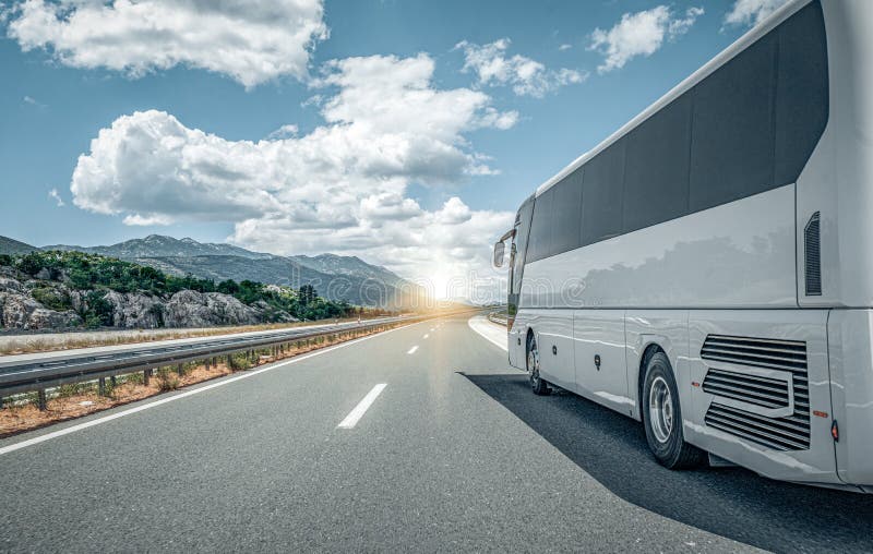 Passenger Bus on the Highway Against the Backdrop of a Beautiful ...