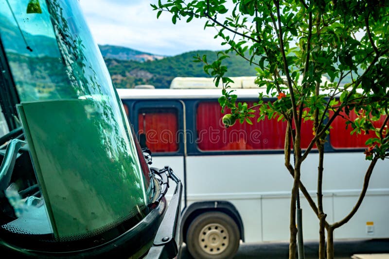 Passenger Buses in the Parking Lot. Focus on the Front Window of the ...