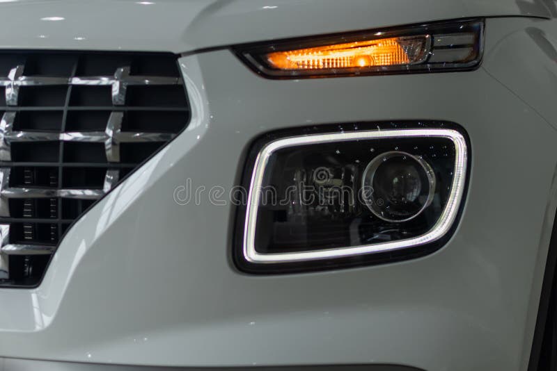 Passenger Car Headlights Switched on Stock Image - Image of modern ...