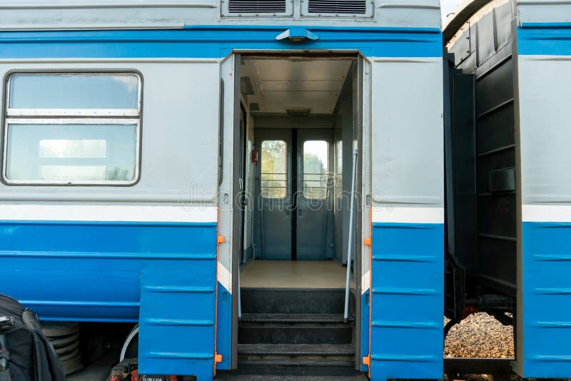 A Passenger Electric Train is Standing on the Platform at the Stop ...