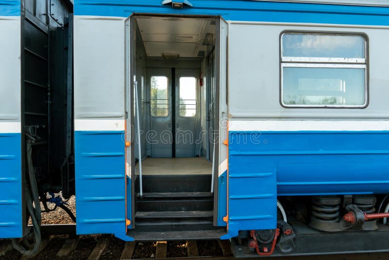 A Passenger Electric Train is Standing on the Platform at the Stop ...