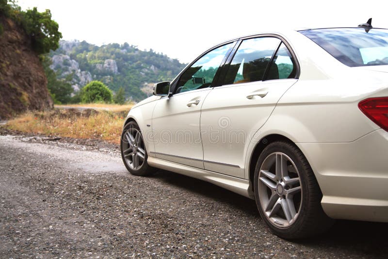 Passenger Expensive White Car on a Dusty Country Road Stock Photo ...
