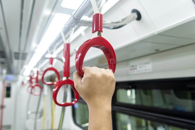 Passenger Hand Holding Handle on the Train Stock Image - Image of ...
