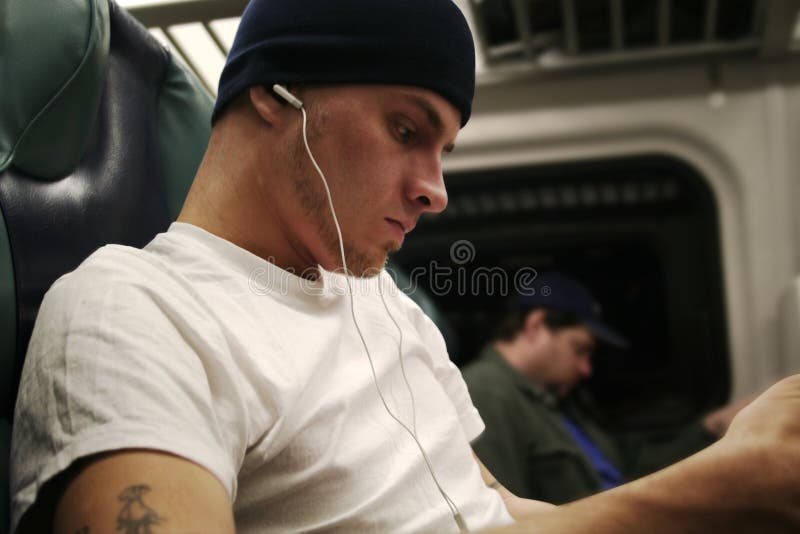 Passenger&Headphones stock photo. Image of device, music - 630996