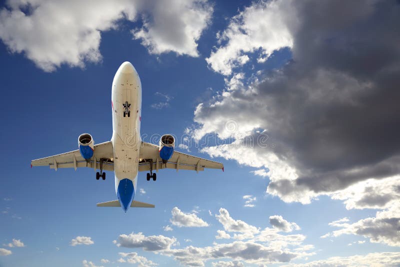 Passenger Jet Plane Flying in the Sky Stock Image - Image of airline ...
