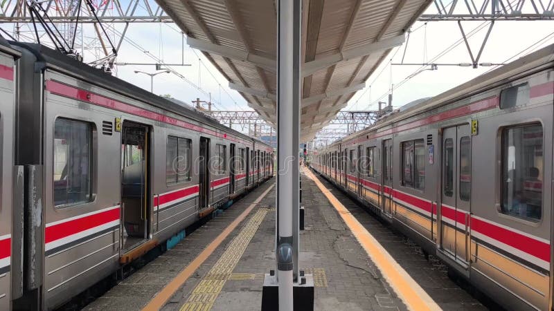 Passenger Lanes between Arriving and Departing Trains Stock Video ...