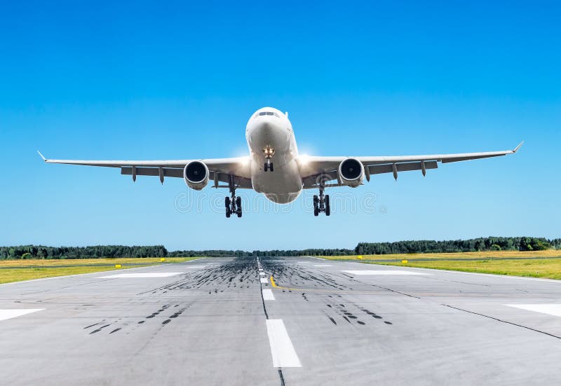 Airplane over the runway stock photo. Image of passenger - 37086700